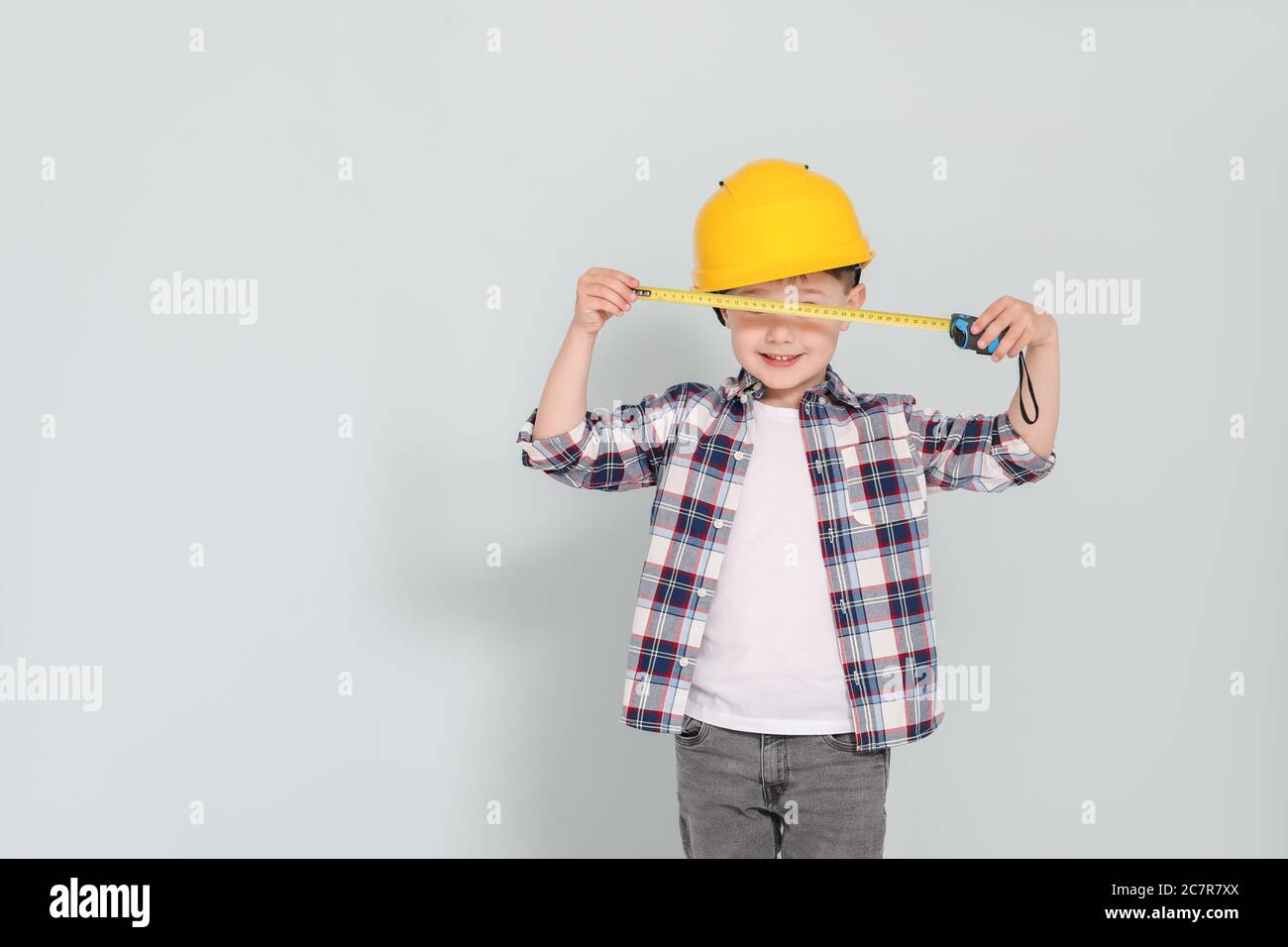 Child using ruler hi-res stock photography and images - Alamy