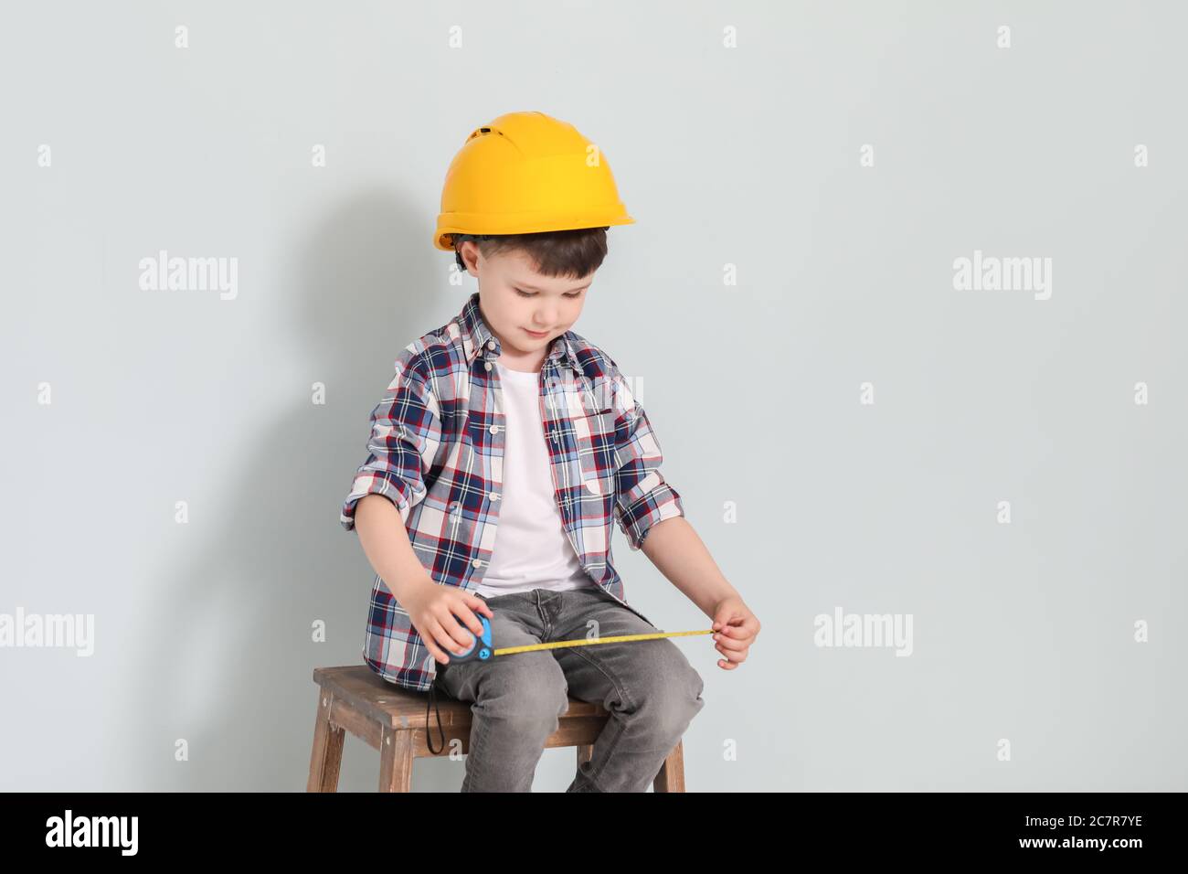 Child using ruler hi-res stock photography and images - Alamy