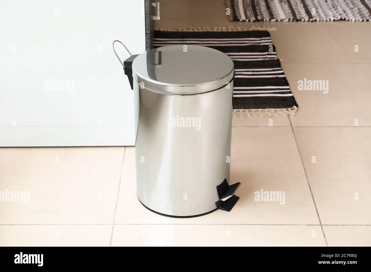 Clean trash bin in modern kitchen Stock Photo - Alamy