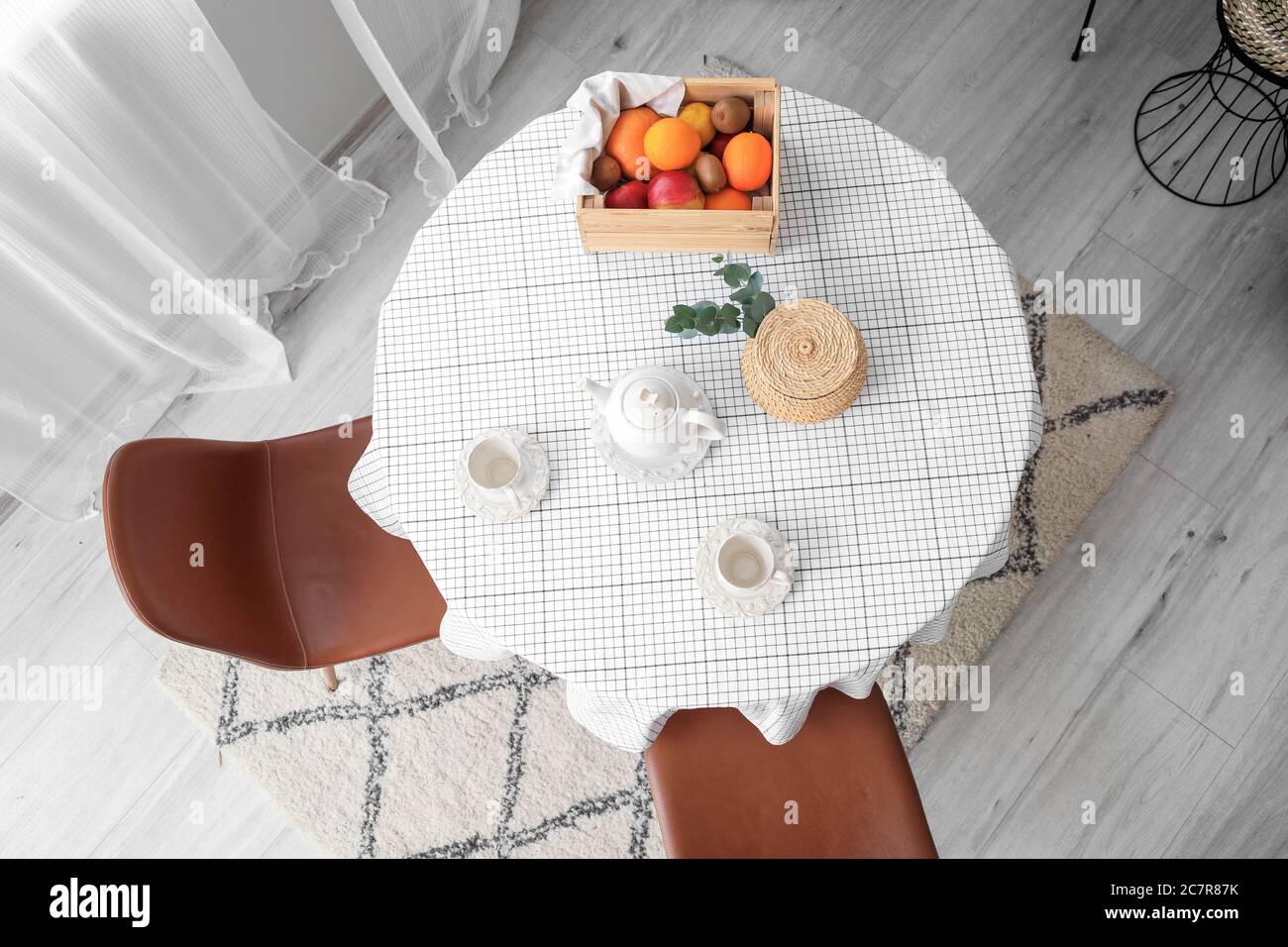 Table set in modern stylish dining room, top view Stock Photo - Alamy