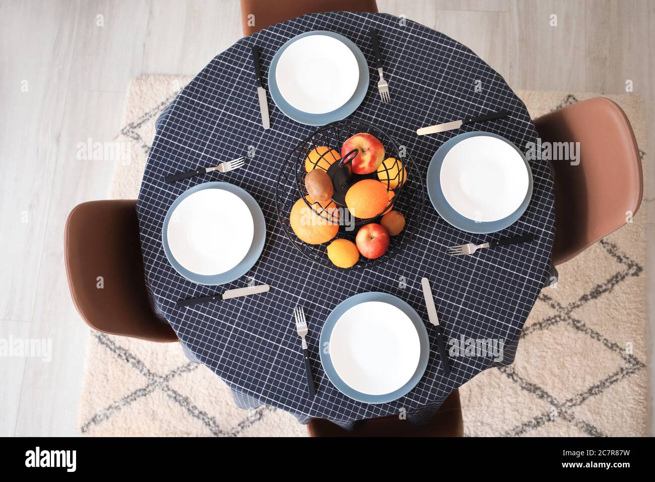 Table set in modern stylish dining room, top view Stock Photo - Alamy