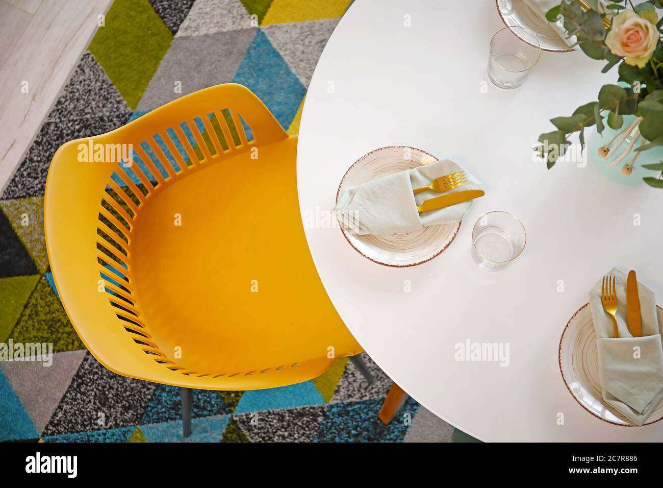Table set in modern stylish dining room, top view Stock Photo - Alamy