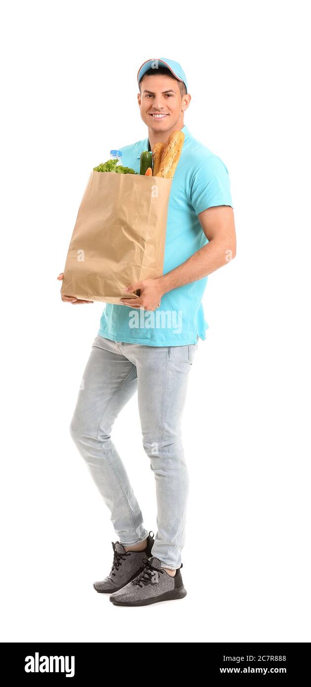 Delivery man with food in bag on white background Stock Photo - Alamy