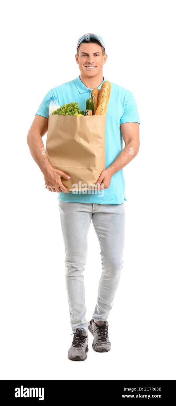 Delivery man with food in bag on white background Stock Photo - Alamy