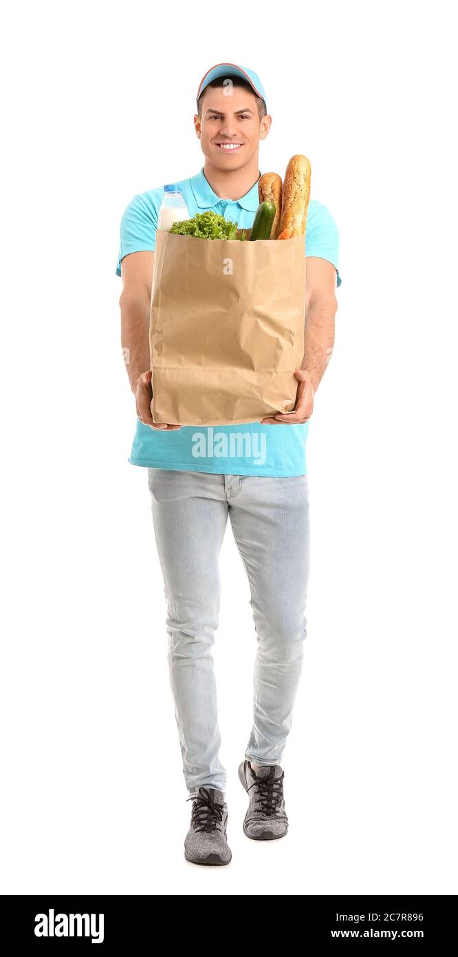 Delivery man with food in bag on white background Stock Photo - Alamy