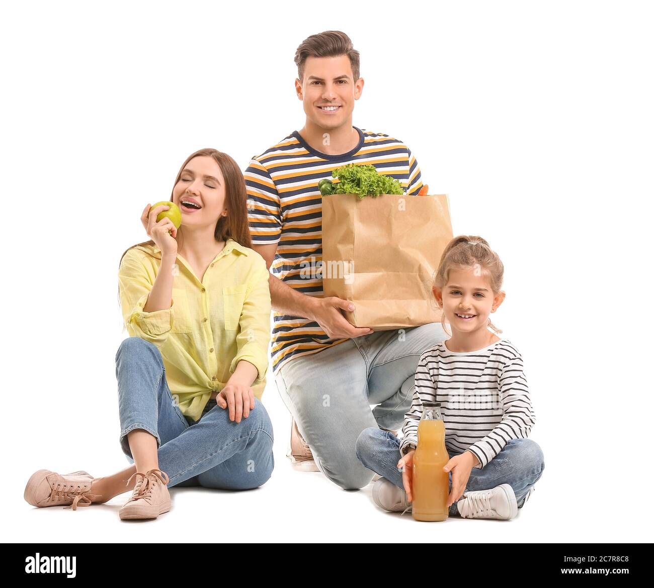 Family with food in bag on white background Stock Photo - Alamy