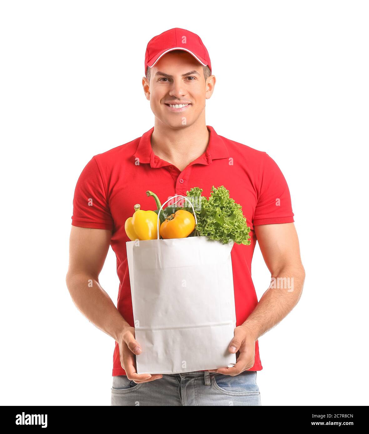 Delivery man with food in bag on white background Stock Photo - Alamy