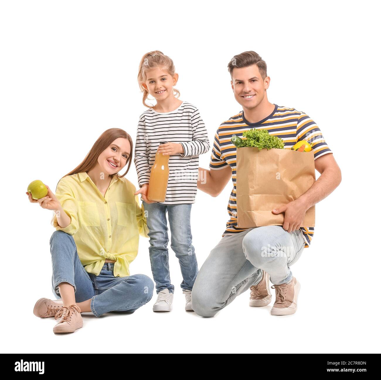 Family with food in bag on white background Stock Photo - Alamy