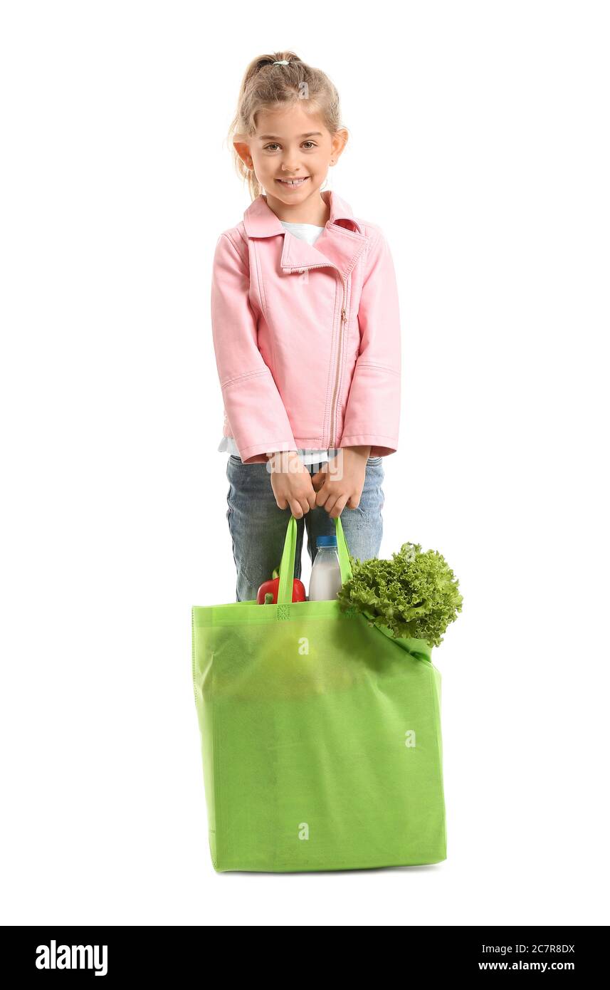 Little girl with food in bag on white background Stock Photo - Alamy
