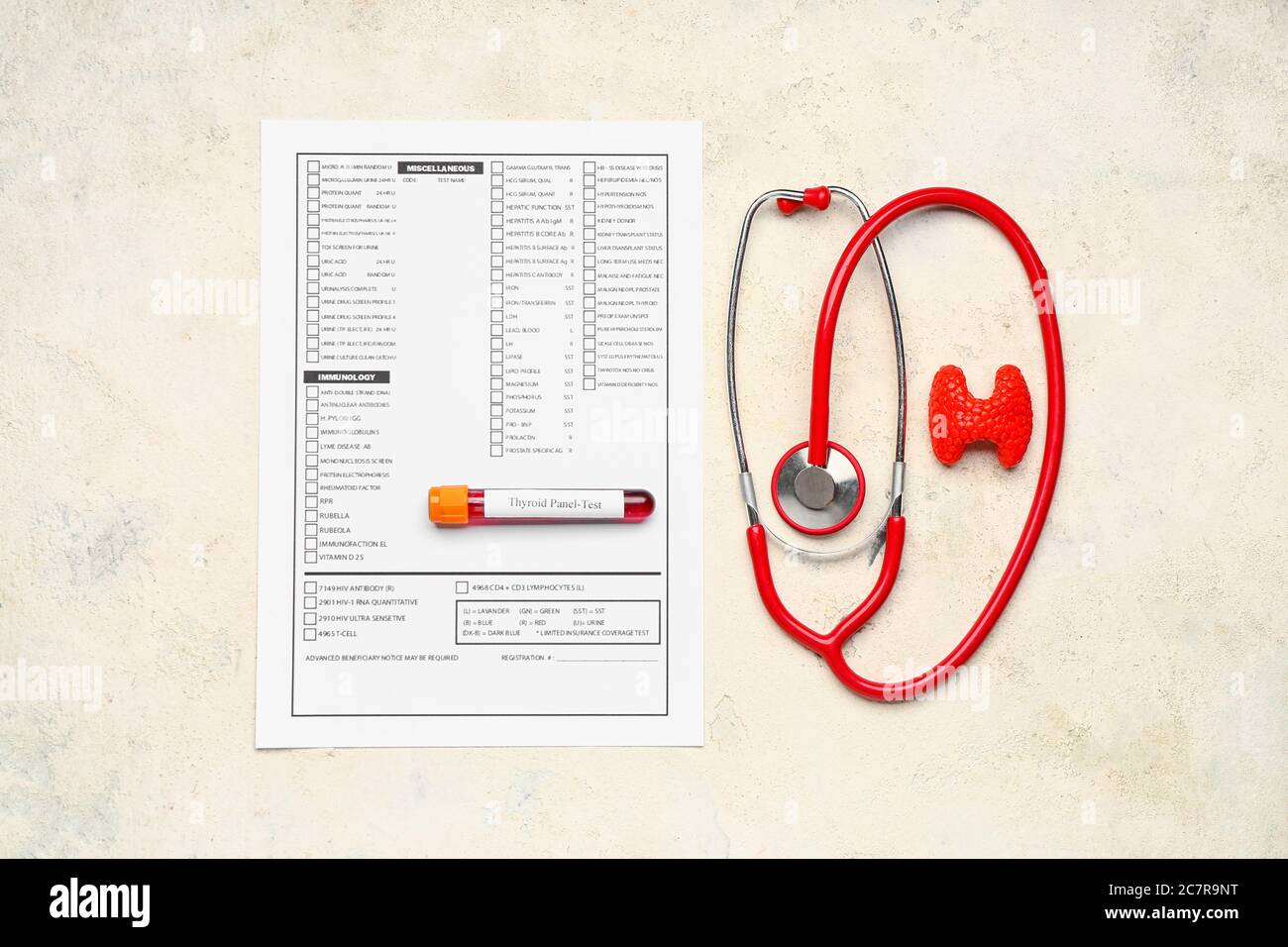 Blood sample in tube with stethoscope, model of thyroid and laboratory ...