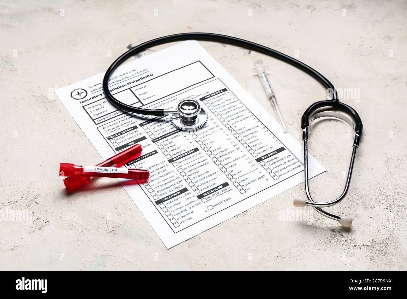 Blood samples in tubes with stethoscope and laboratory test form on ...