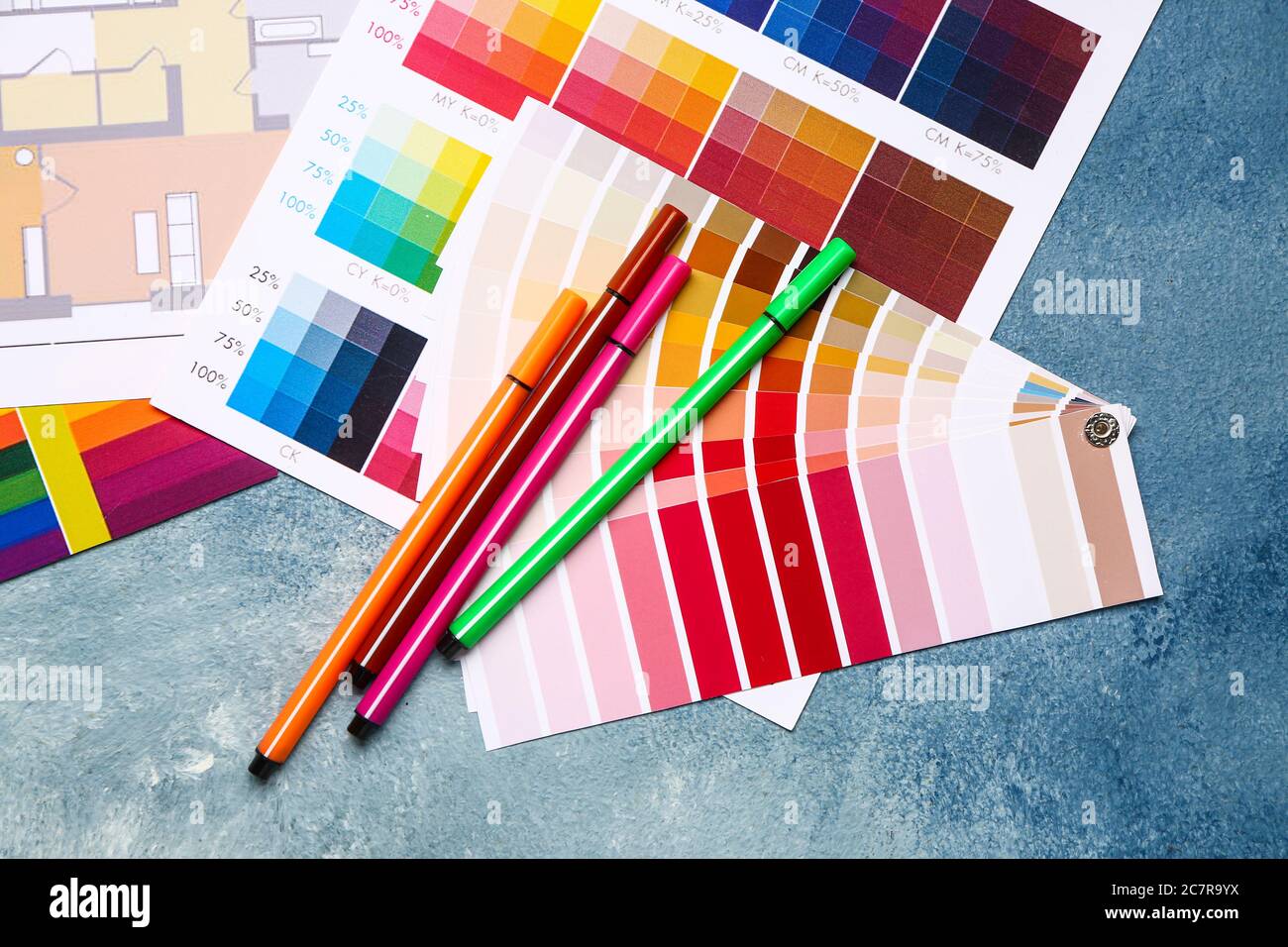 Color palettes with building plan on blue background Stock Photo - Alamy