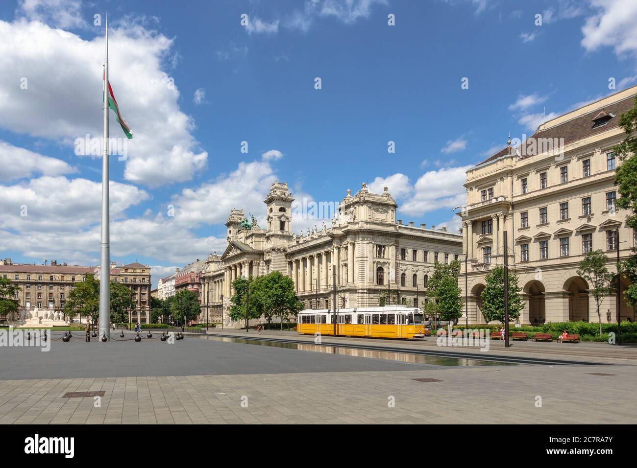A tram rolling through Kossuth ter with the Museum of Ethnography in ...