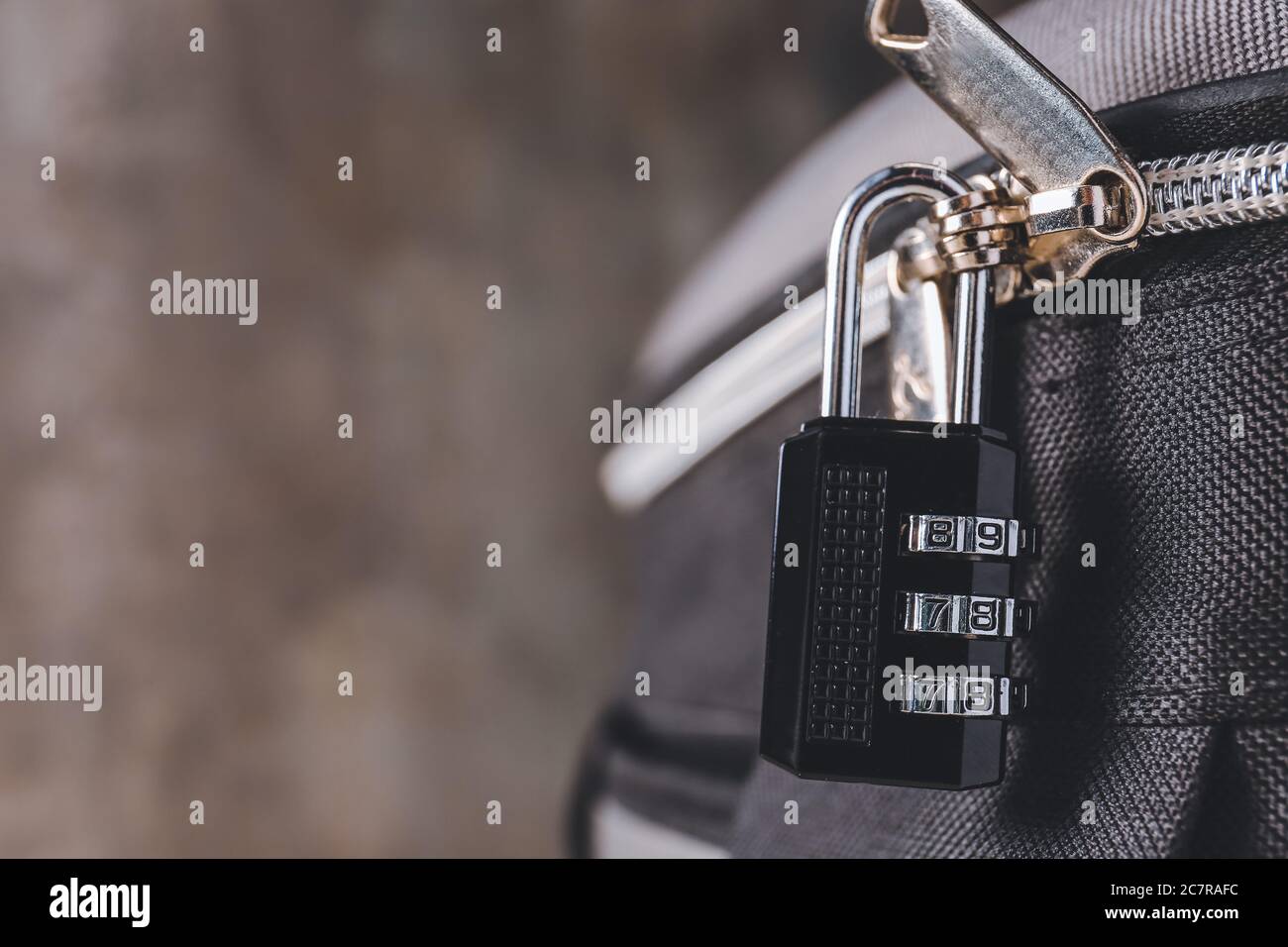 Suitcase with lock on grey background, closeup Stock Photo - Alamy