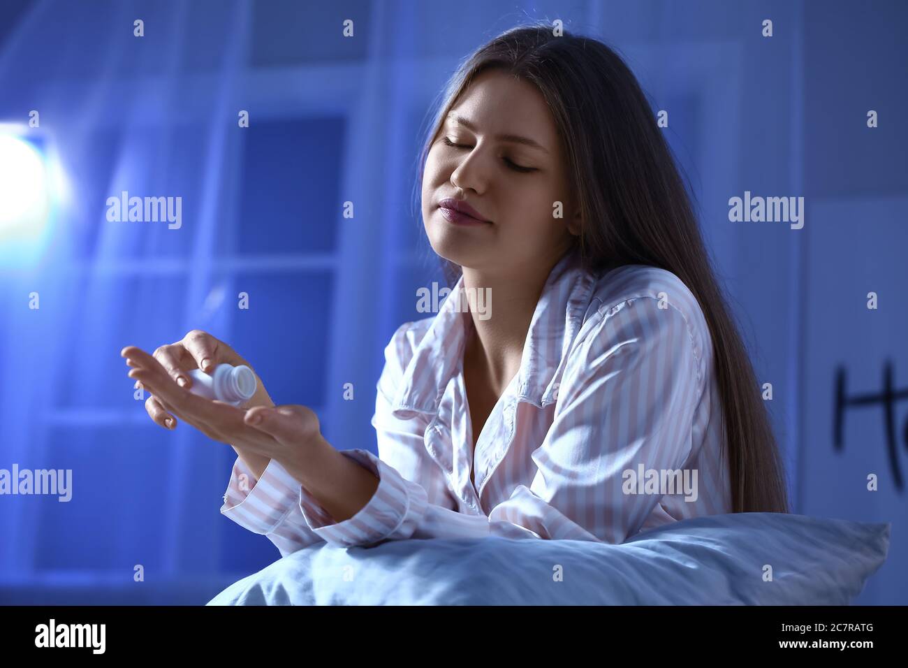Young woman taking nap home hi-res stock photography and images - Alamy