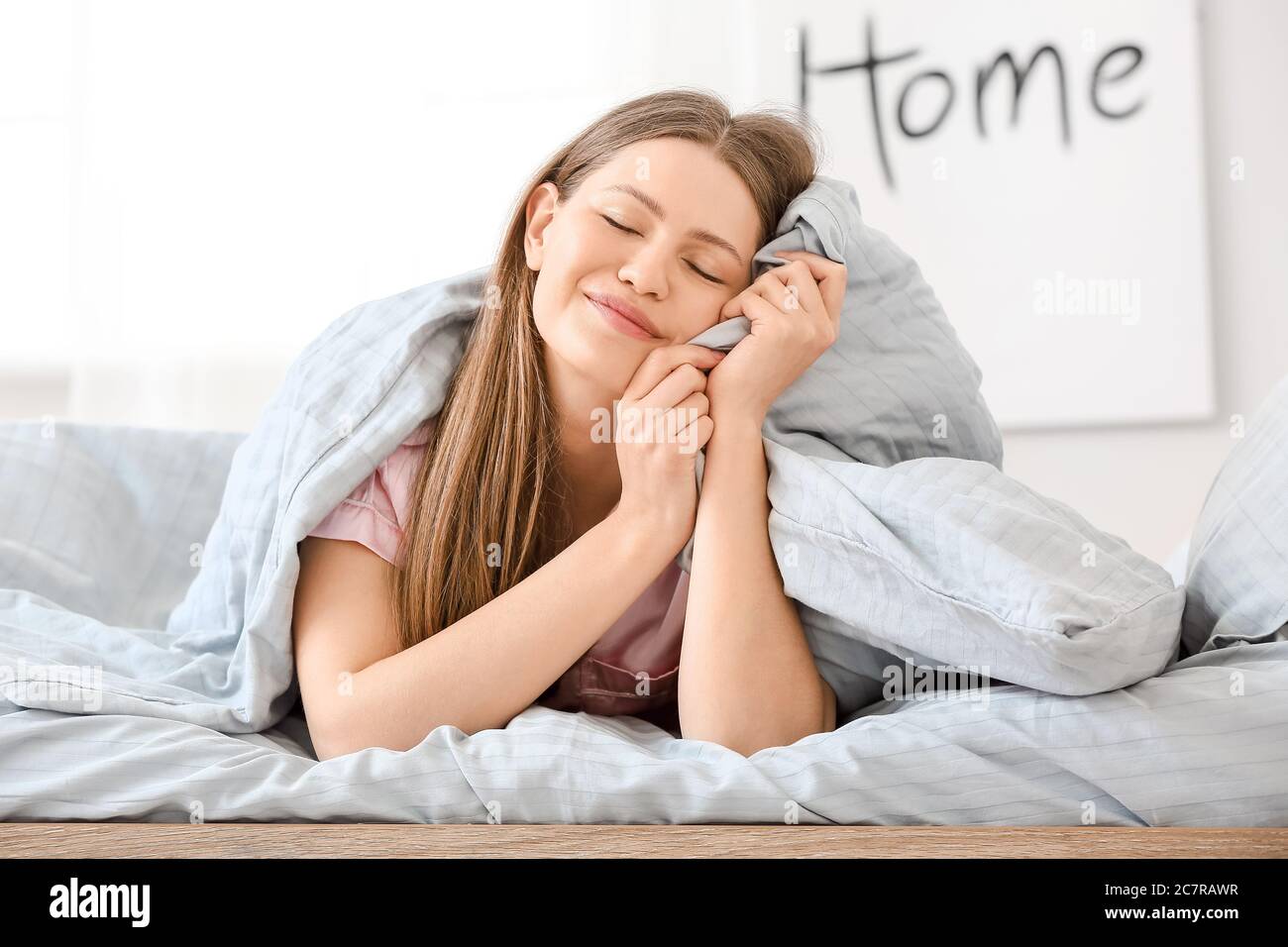 Morning of beautiful young woman in bedroom Stock Photo - Alamy