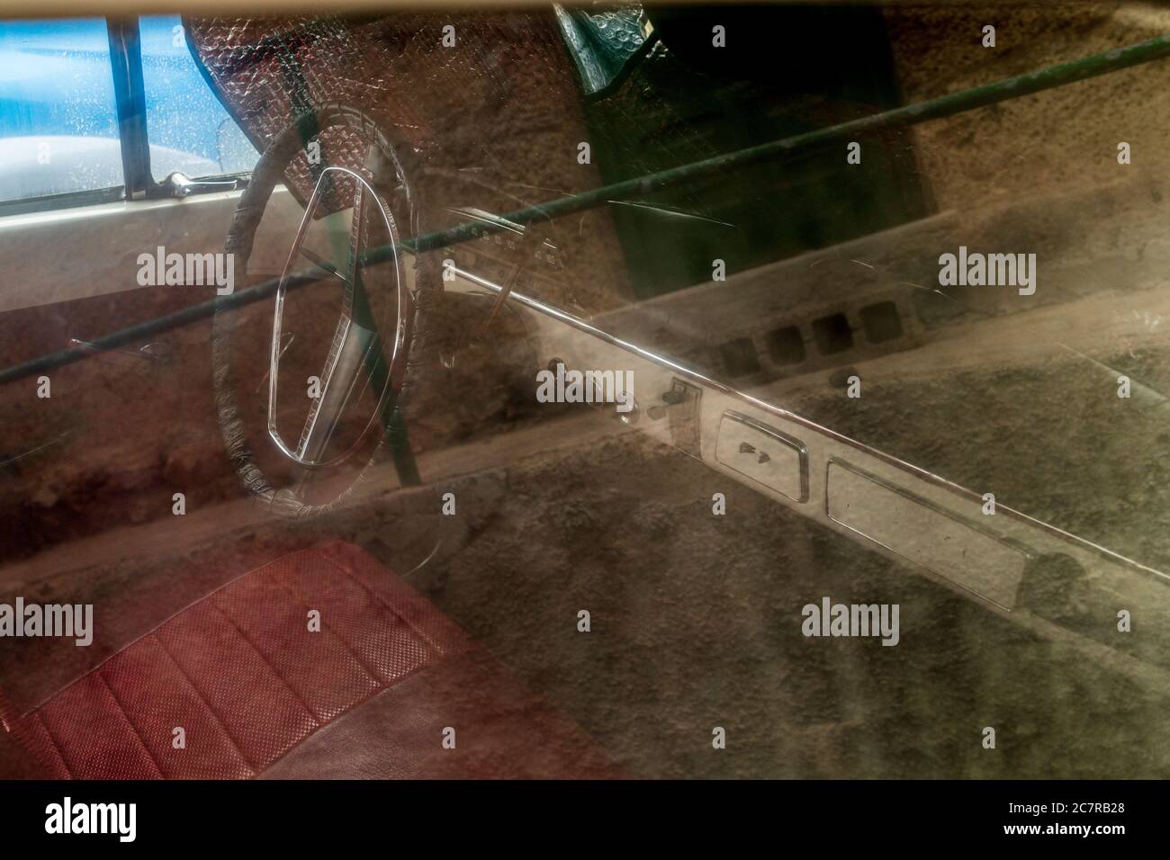 Volvo 122S Sedan car interior steering wheel and dashboard seen through ...