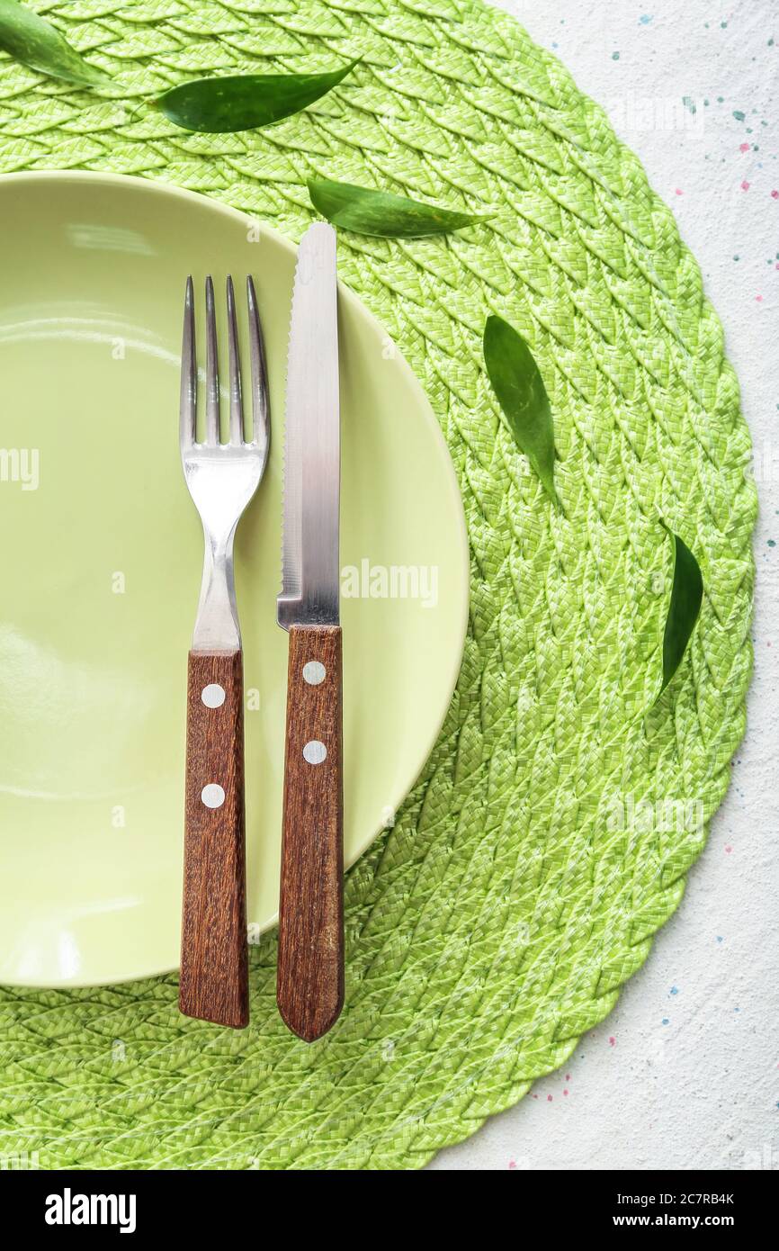 Simple table setting on white background Stock Photo - Alamy