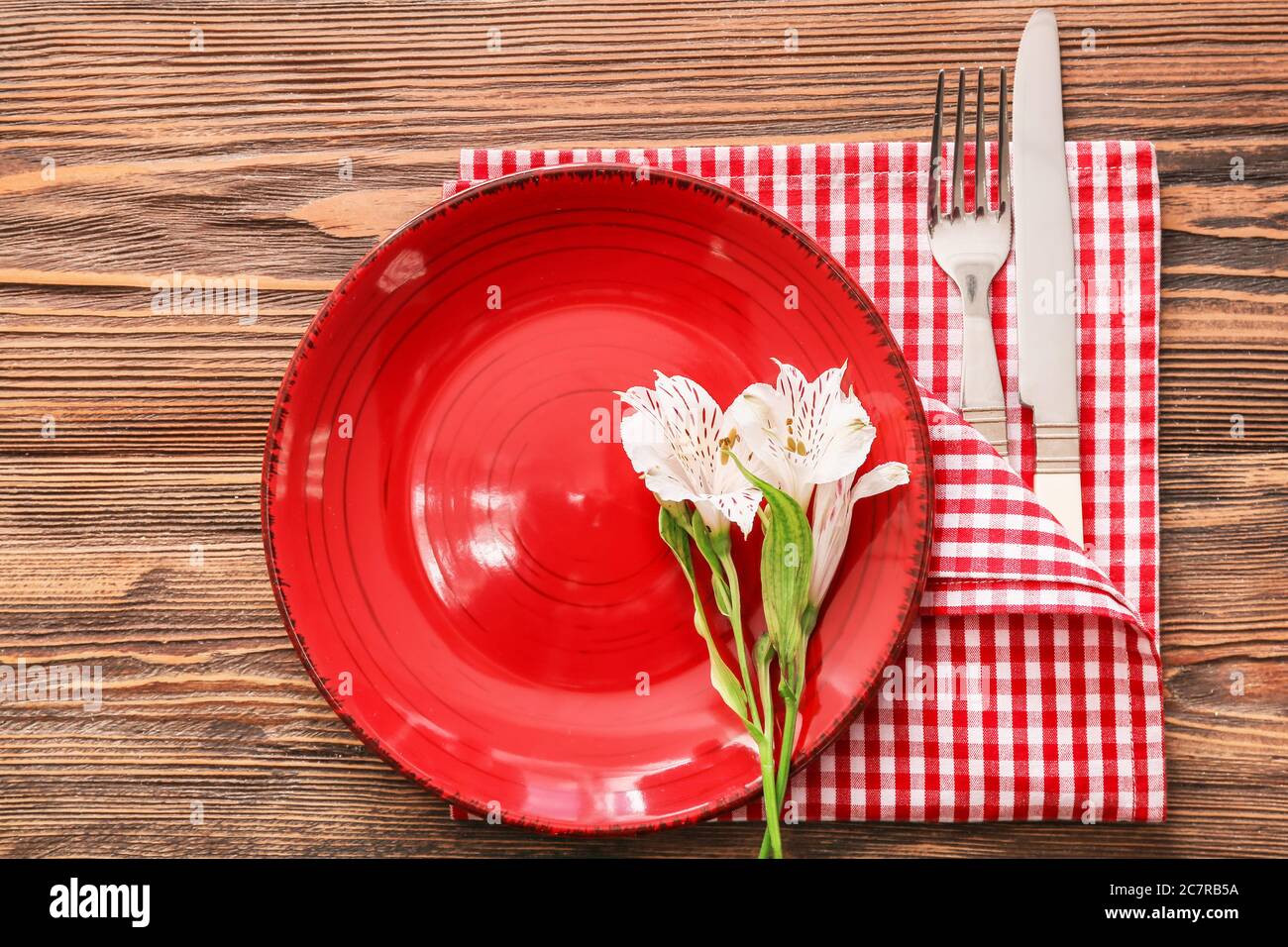 Simple table setting on wooden background Stock Photo - Alamy