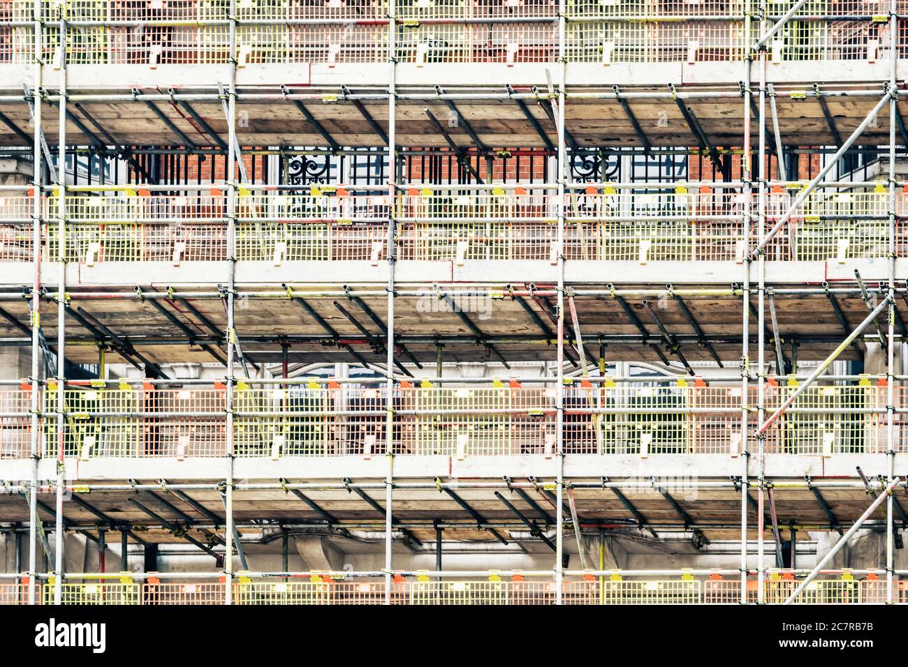 Colorful staging of a building construction site Stock Photo - Alamy