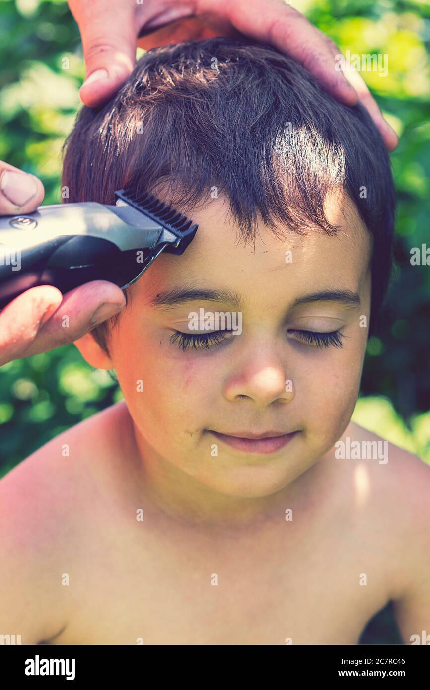 Boys Cut Hair High Resolution Stock Photography and Images - Alamy