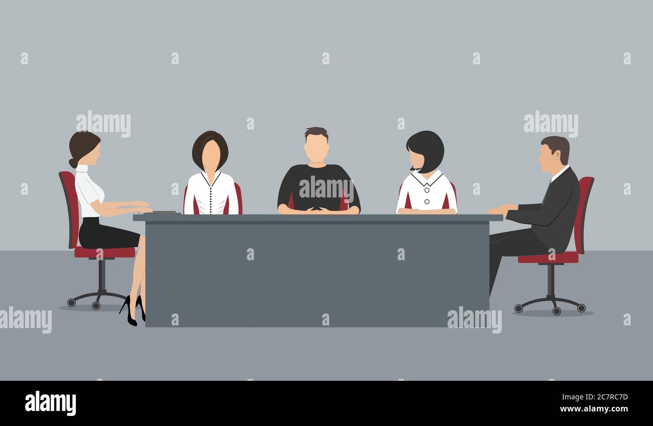 Office workers during a meeting. Employees are sitting at the table in ...