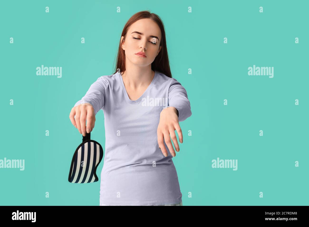 Female sleepwalker on color background Stock Photo - Alamy