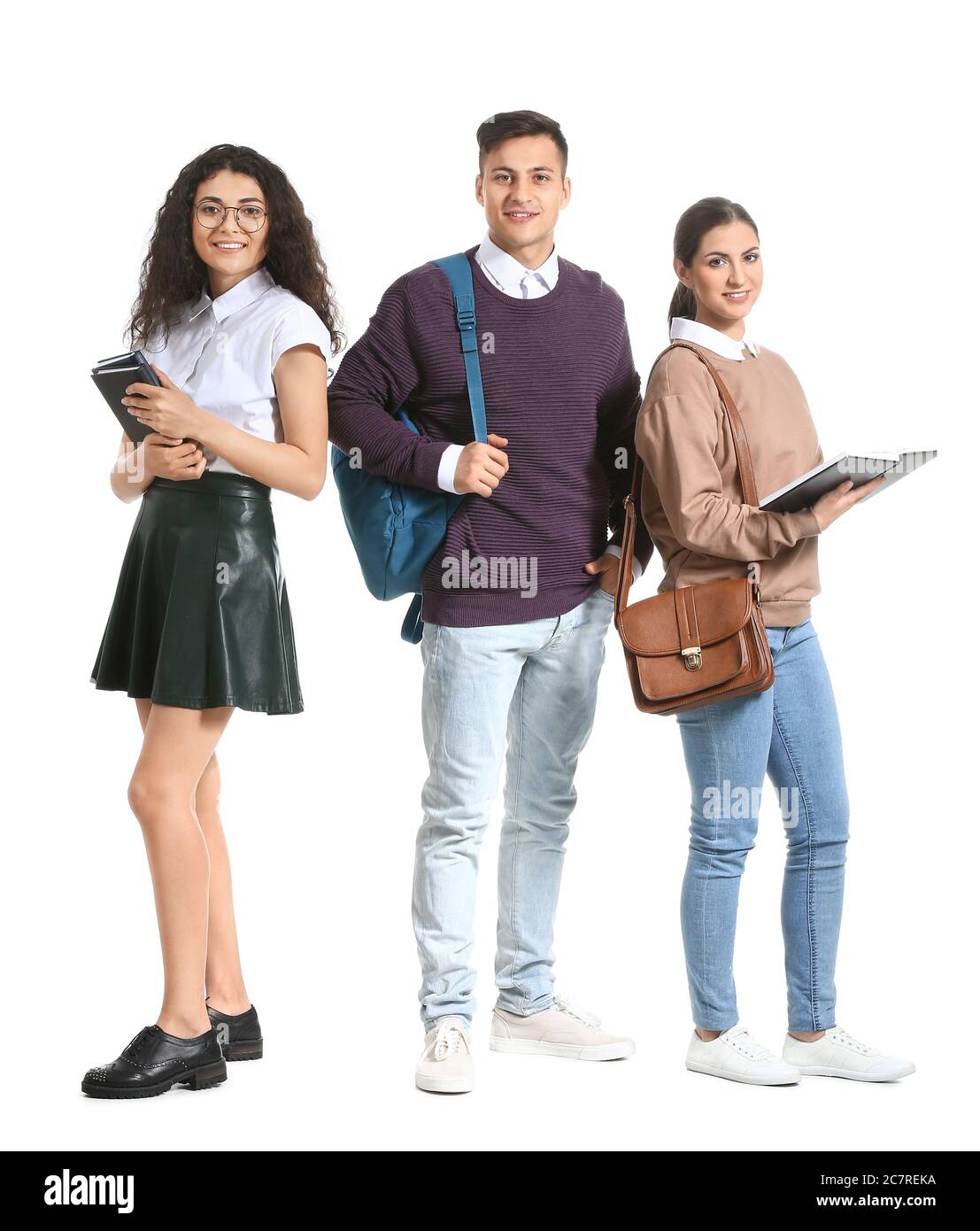 Young students on white background Stock Photo - Alamy