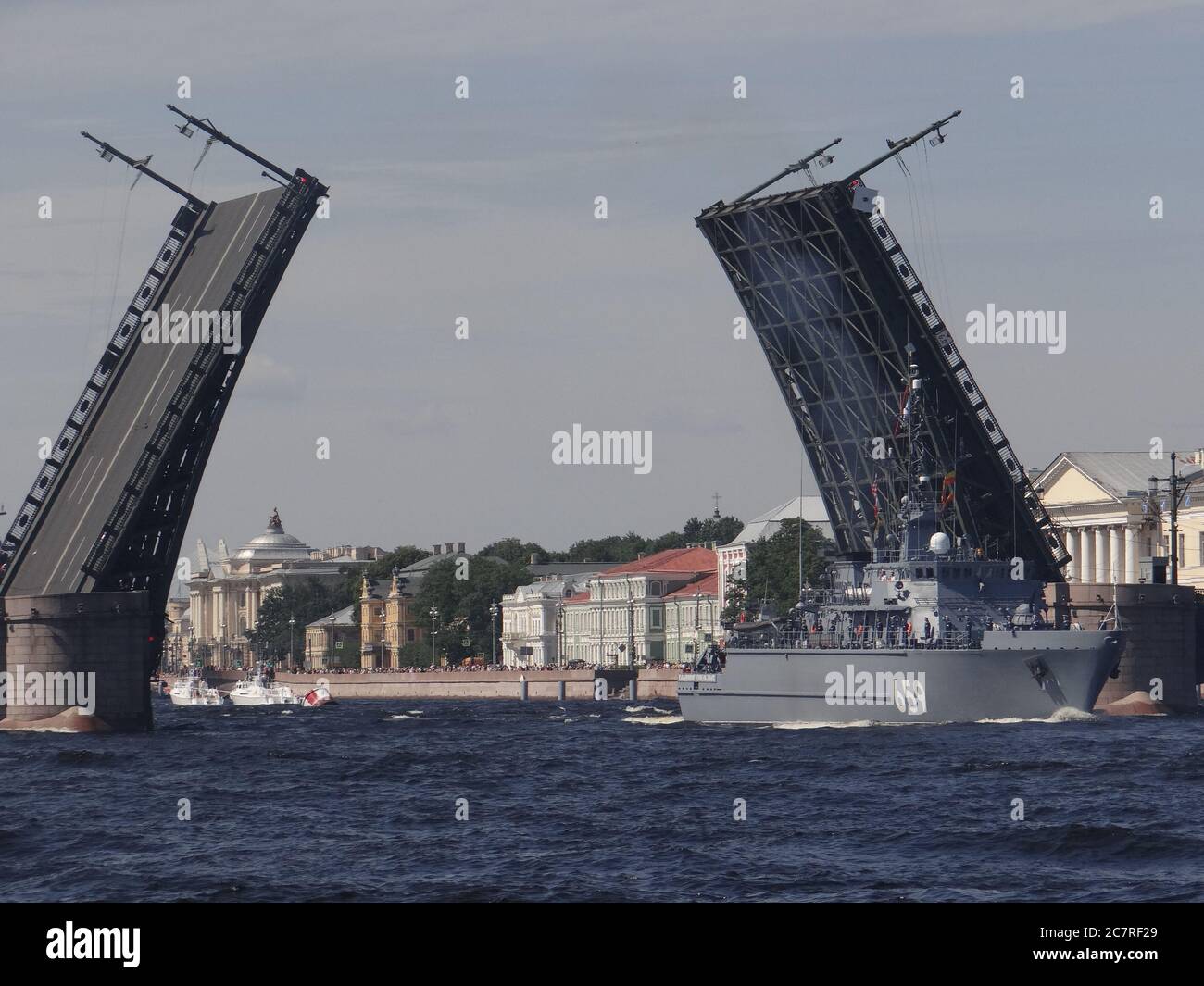 Many maritime ships went through opened bridges in St Petersburg for ...