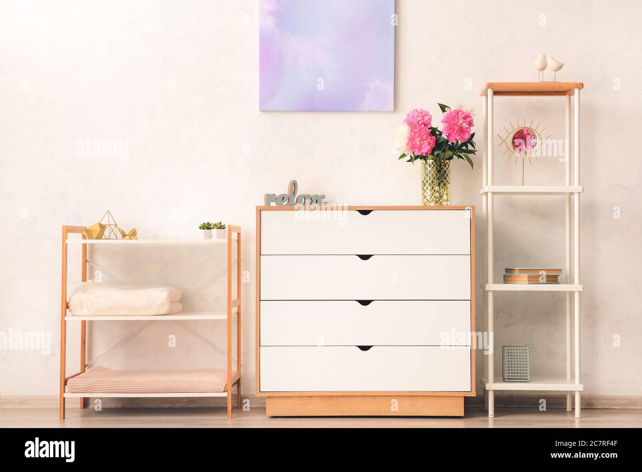 Interior of room with modern chest of drawers Stock Photo - Alamy