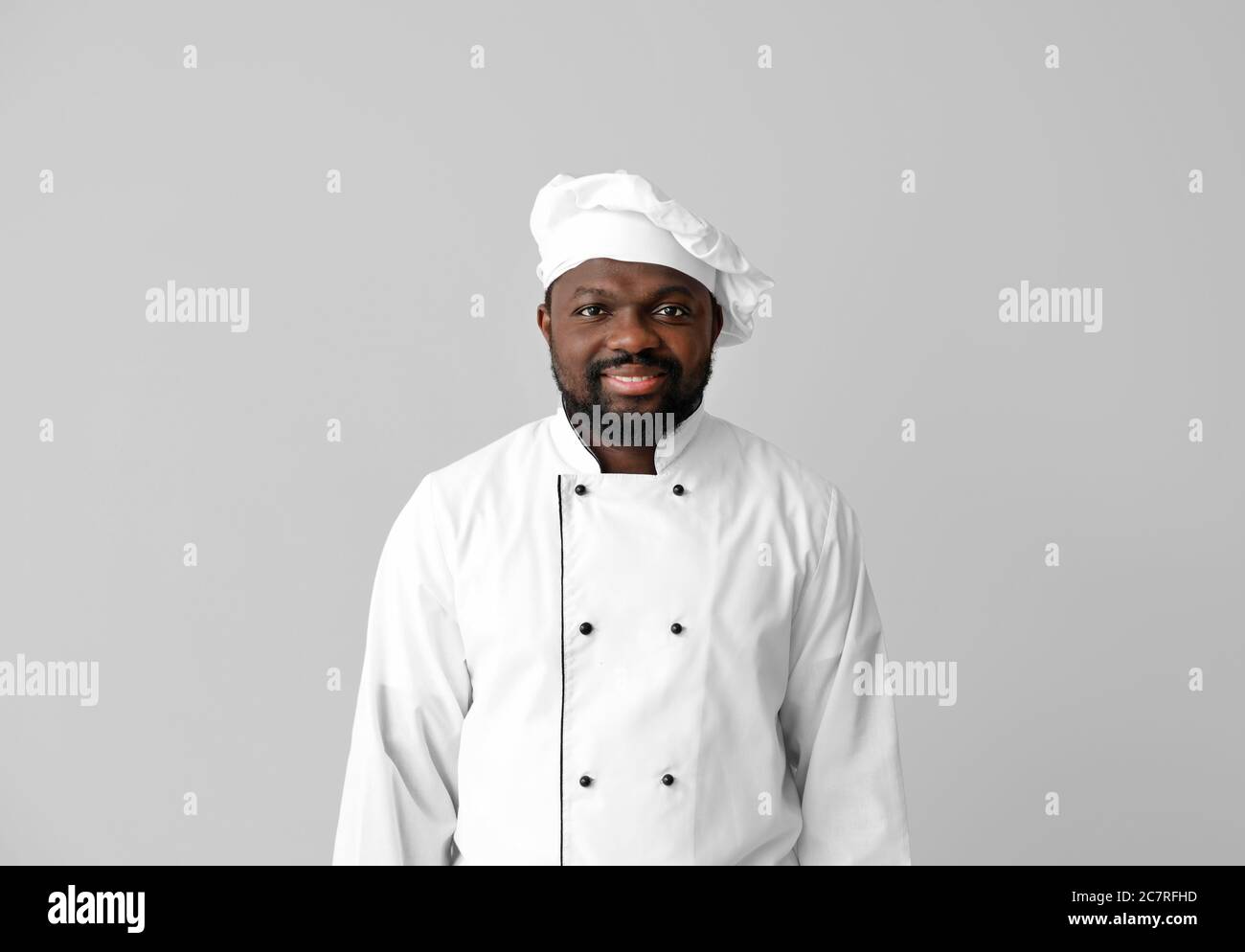 Male African-American chef on white background Stock Photo - Alamy