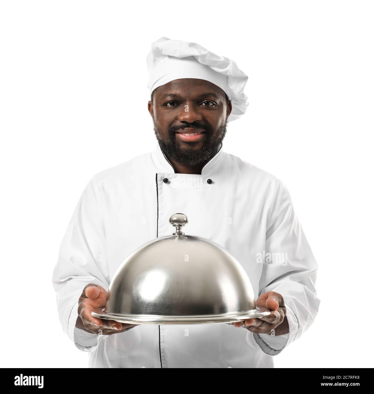 Male African-American chef with tray and cloche on white background ...