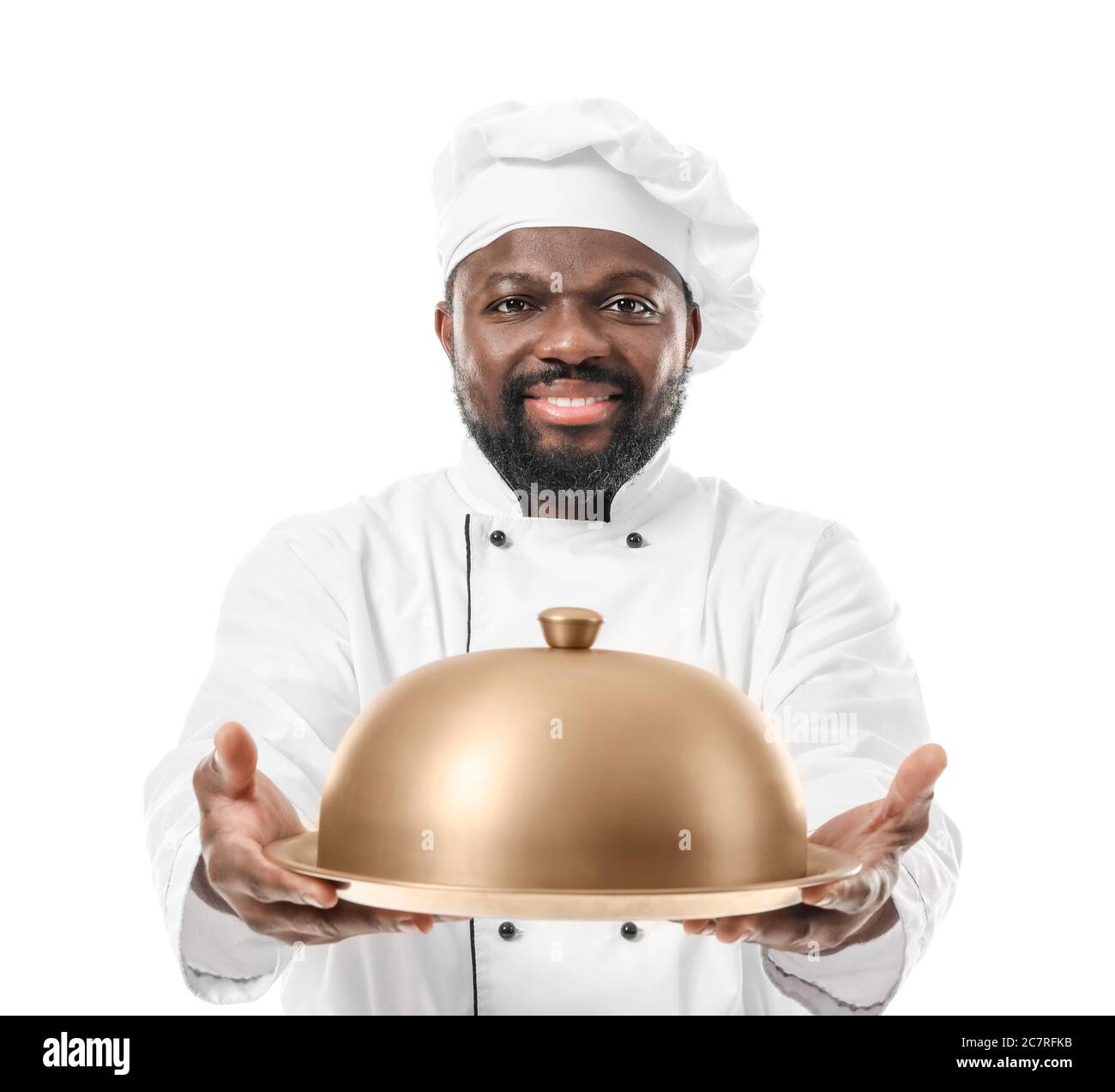 Male African-American chef with tray and cloche on white background ...
