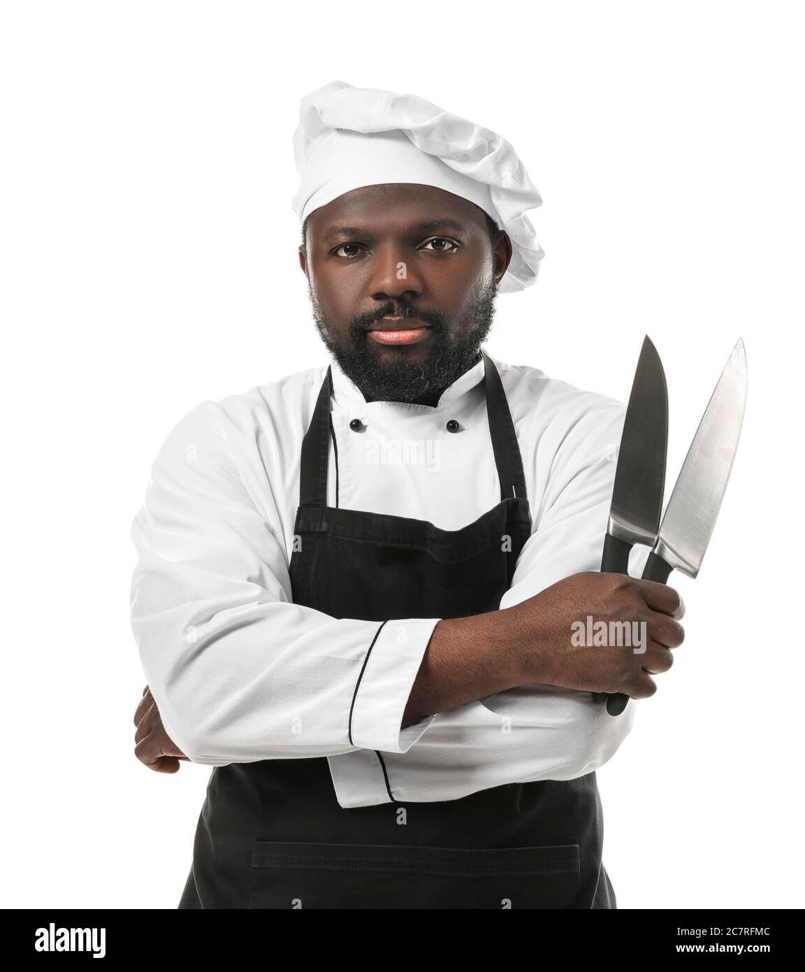 Male African-American chef with knives on white background Stock Photo ...