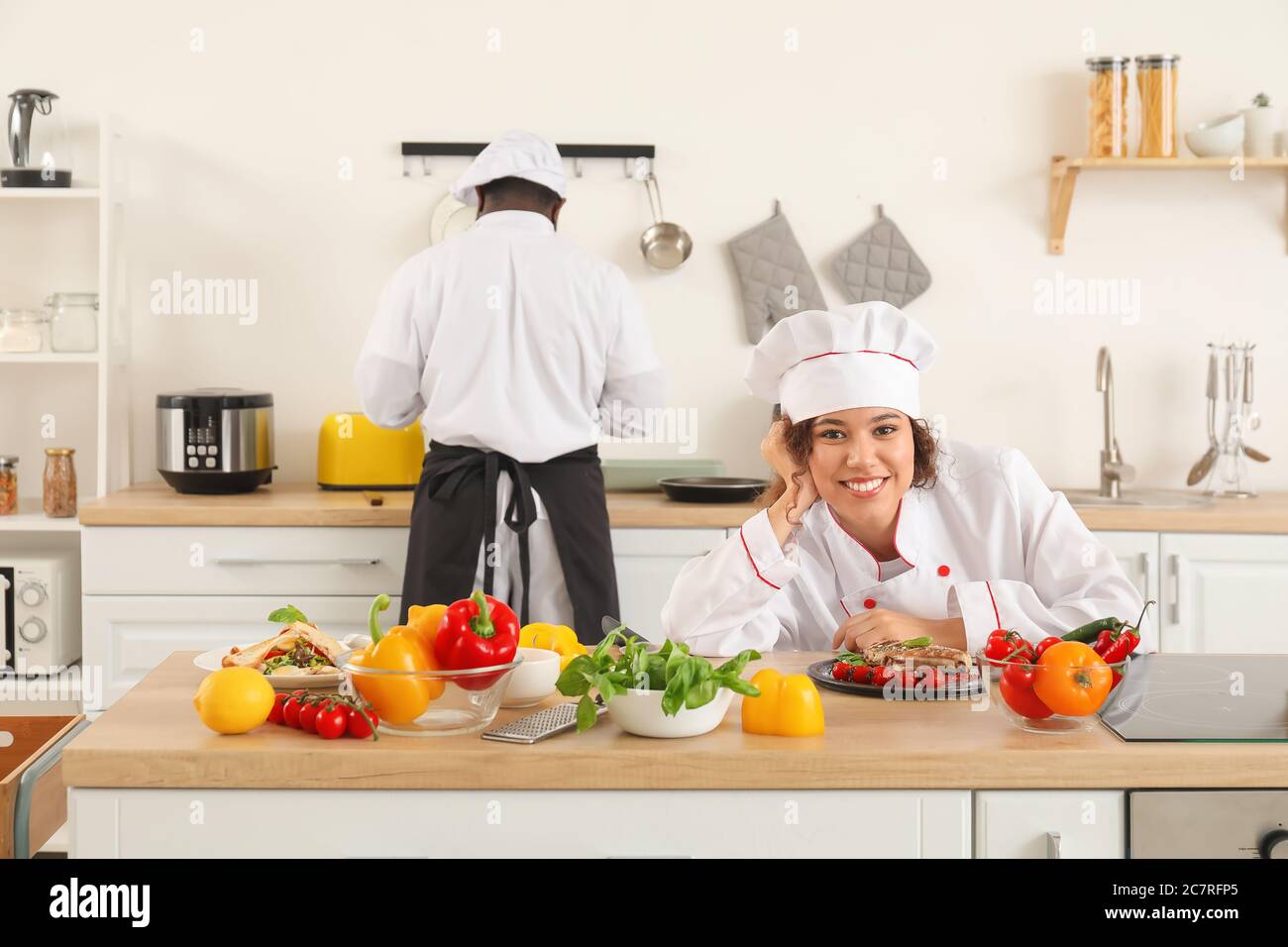 African-American chefs cooking in kitchen Stock Photo - Alamy