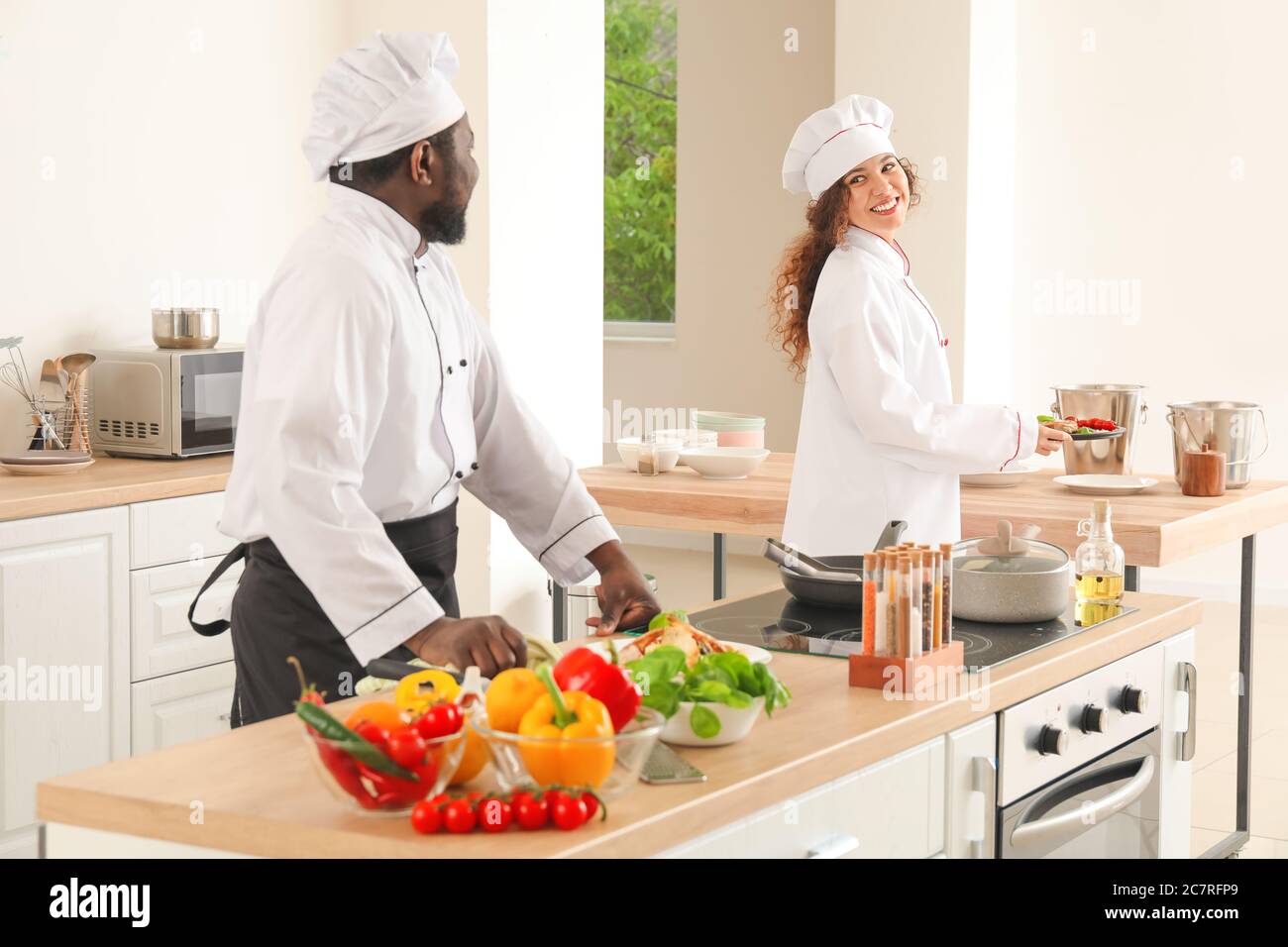 African-American chefs cooking in kitchen Stock Photo - Alamy
