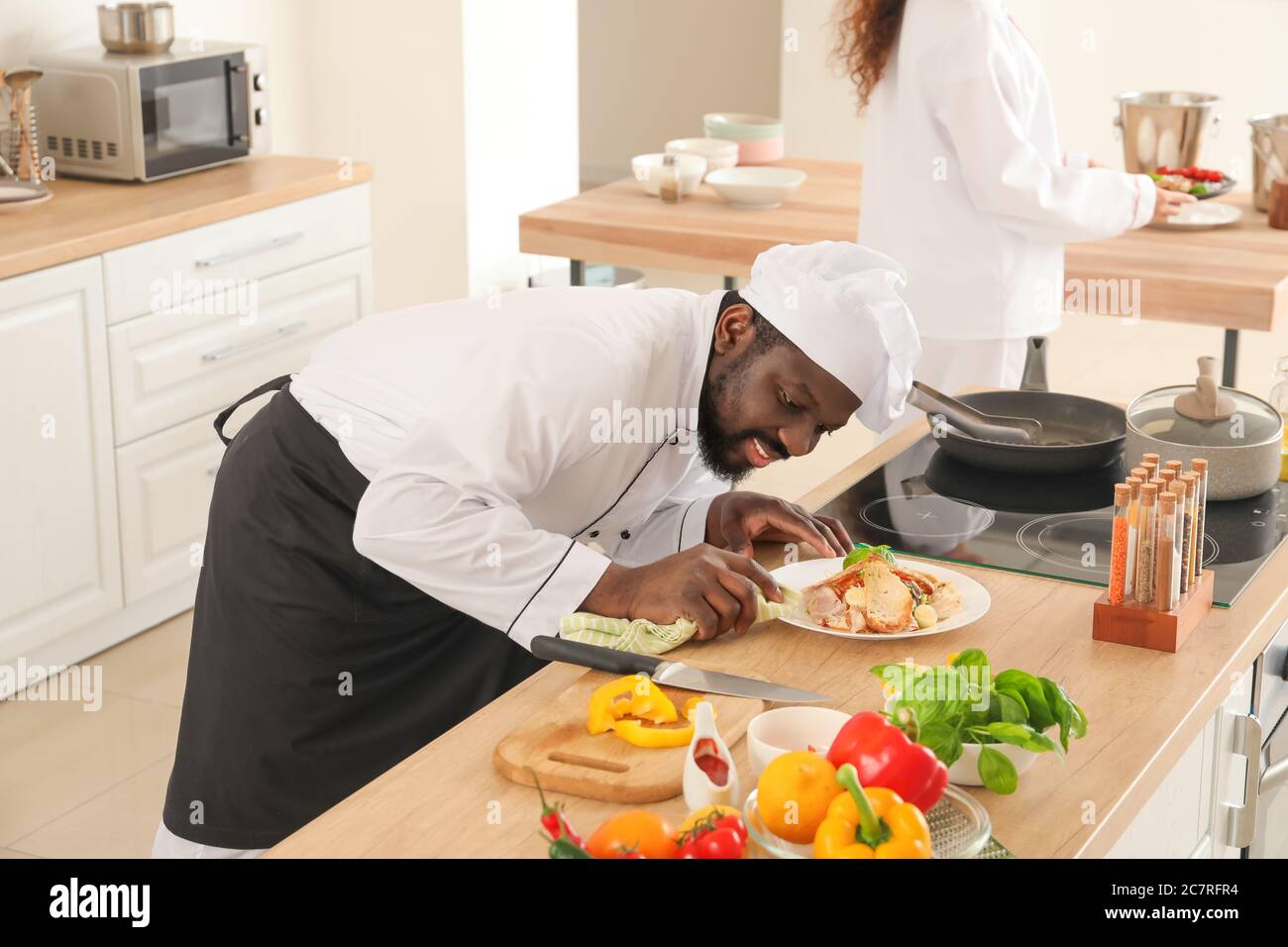 African-American chefs cooking in kitchen Stock Photo - Alamy