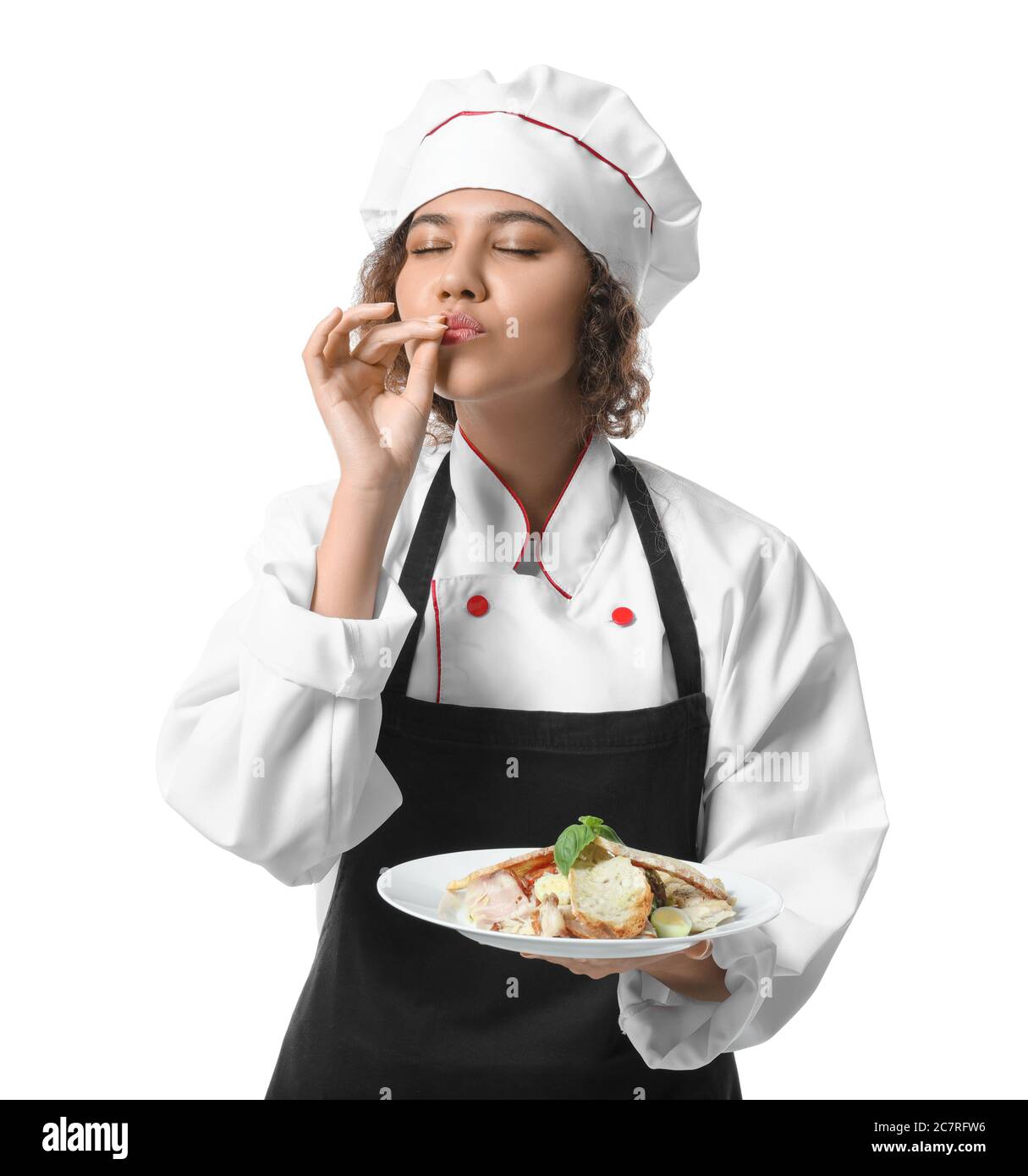 Female African-American chef with tasty dish on white background Stock ...