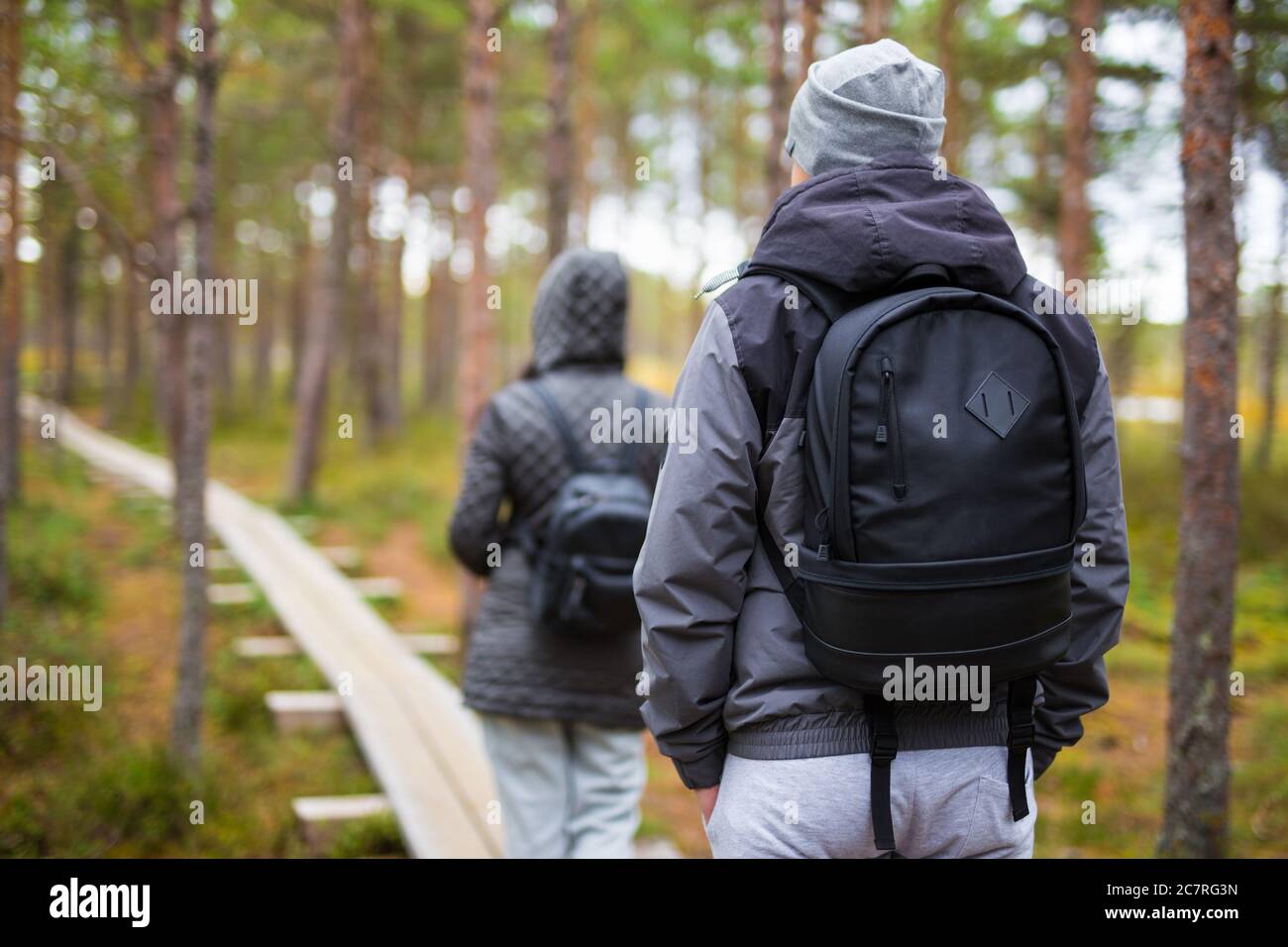 Back view couple backpacking in hi-res stock photography and images - Alamy