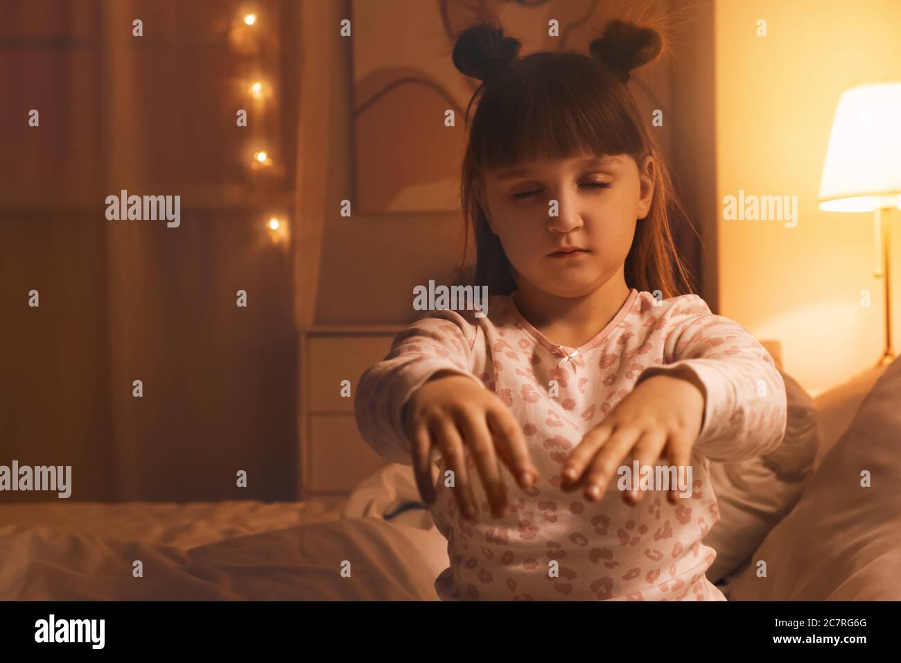 Little sleepwalker in bedroom at night Stock Photo - Alamy