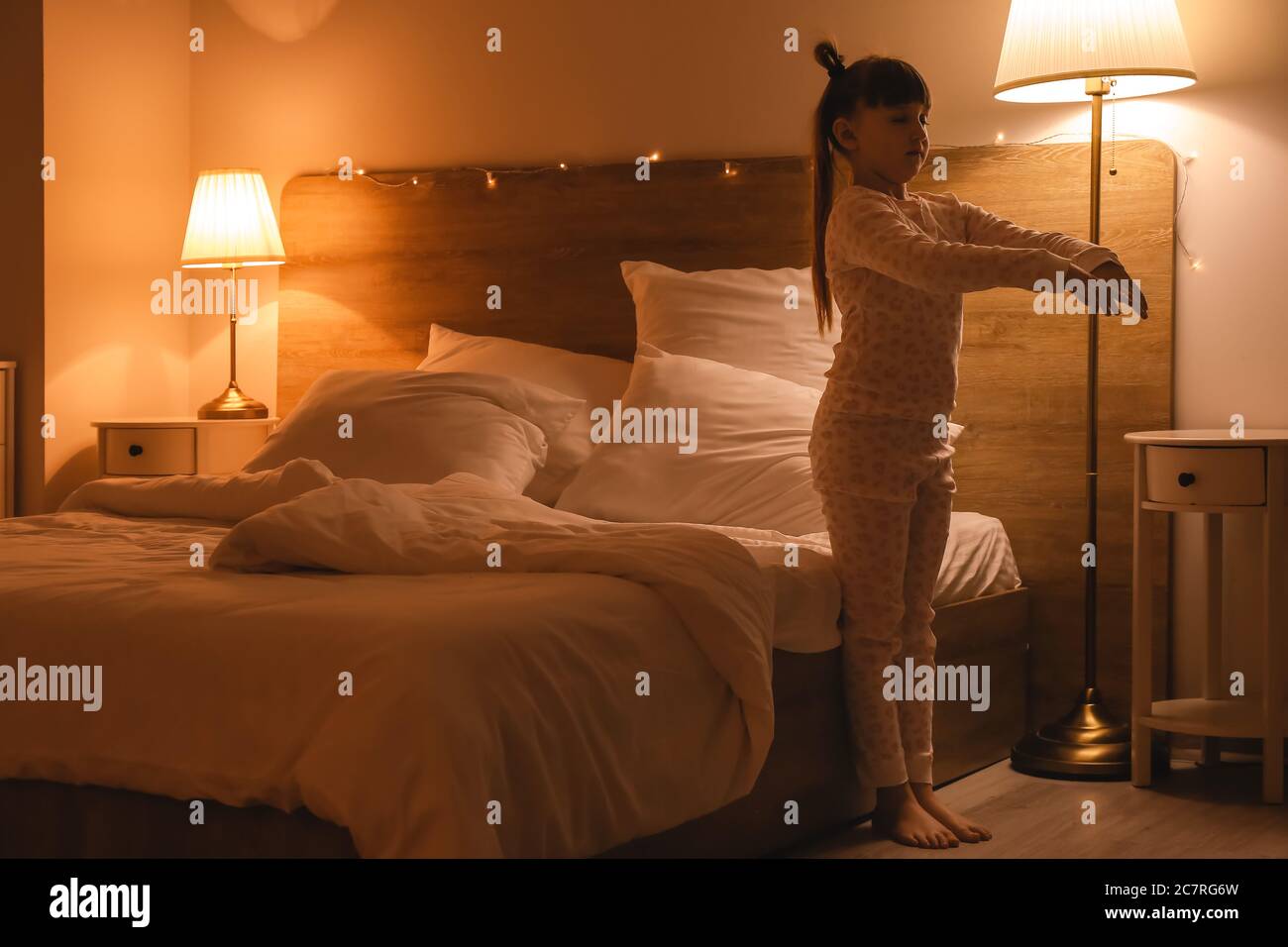 Little sleepwalker in bedroom at night Stock Photo - Alamy