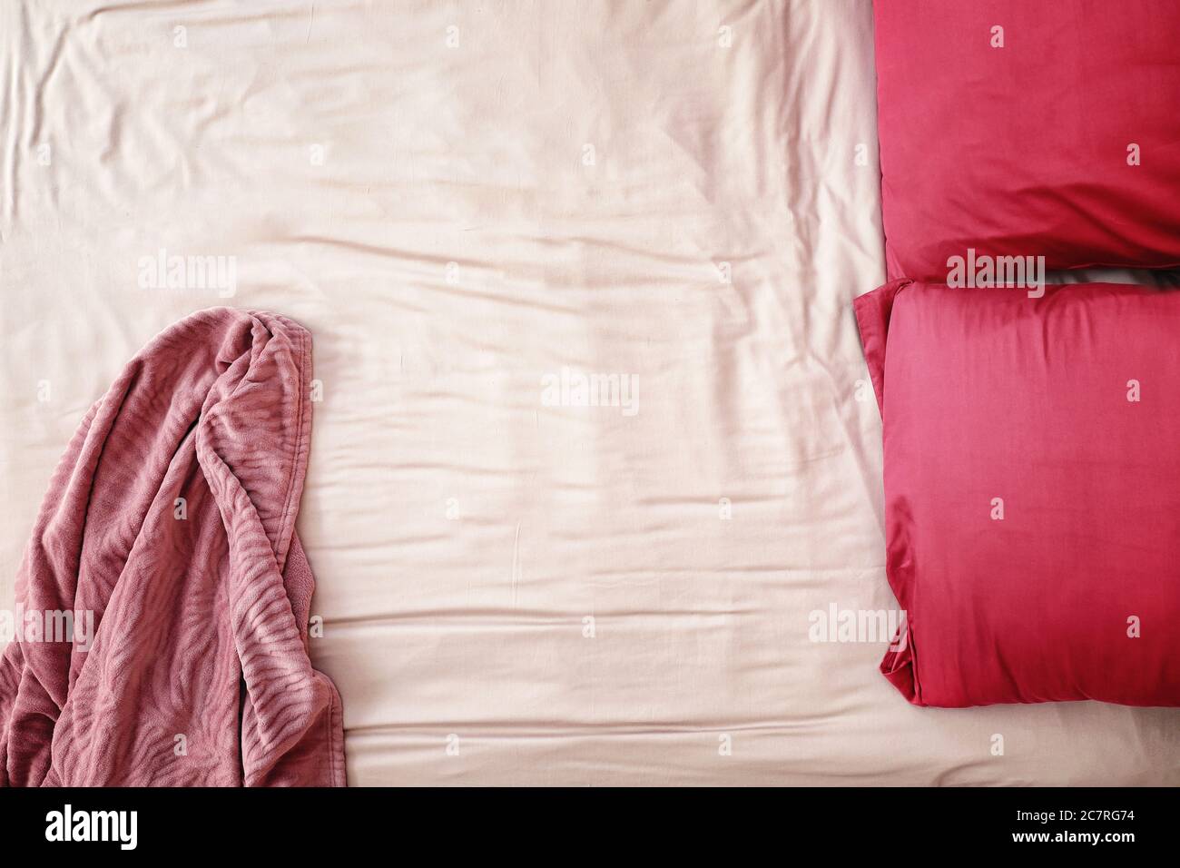 Big comfortable bed in room, top view Stock Photo - Alamy