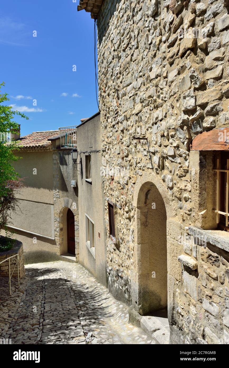 Narrow medieval street in small village Seguret, one from list of most ...