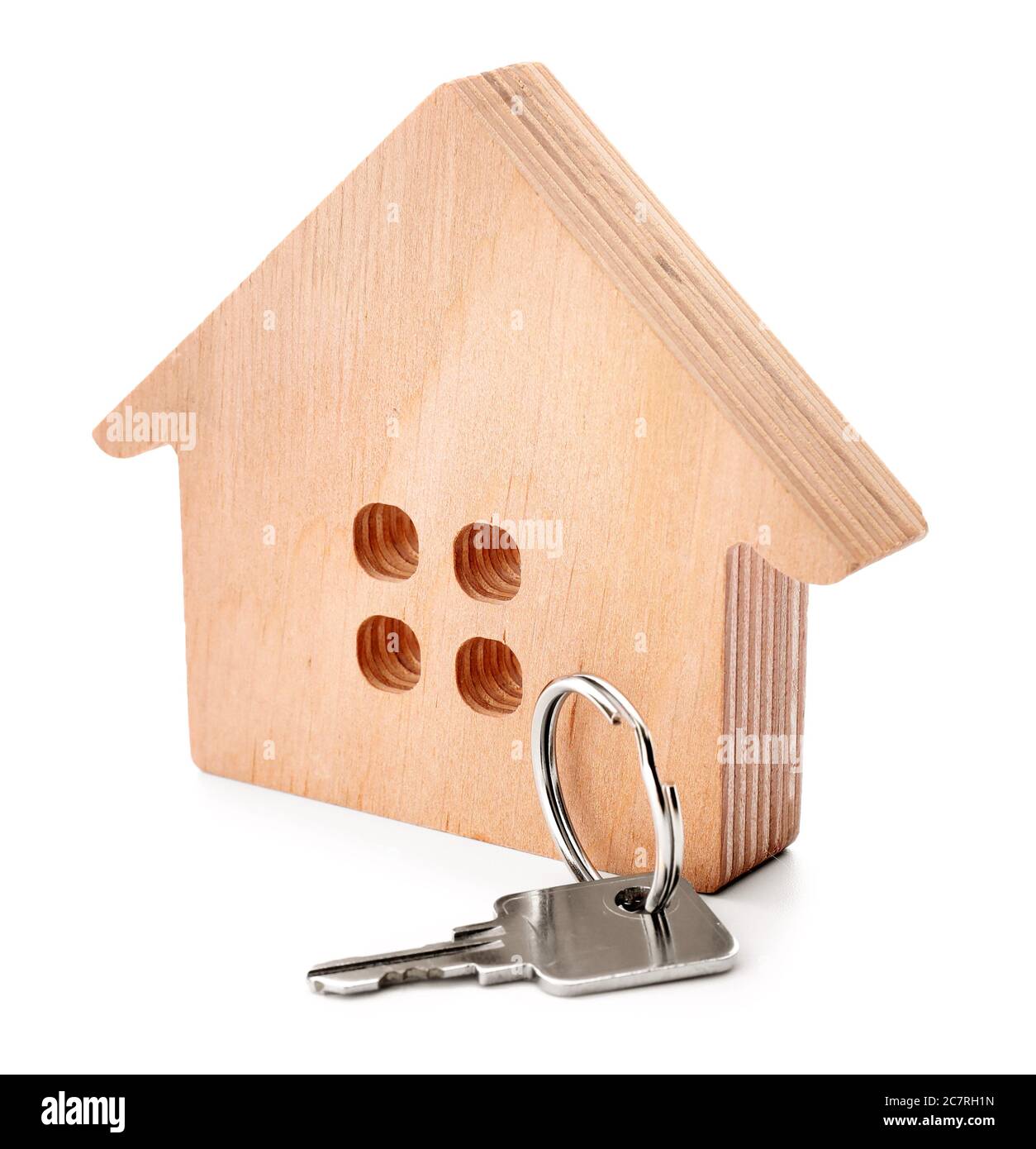 Wooden model house key Cut Out Stock Images & Pictures - Alamy