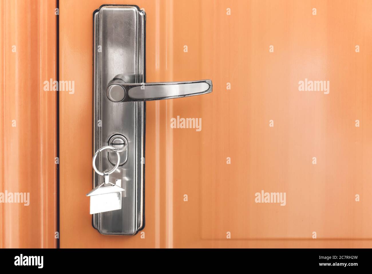 View of door with key, closeup Stock Photo - Alamy