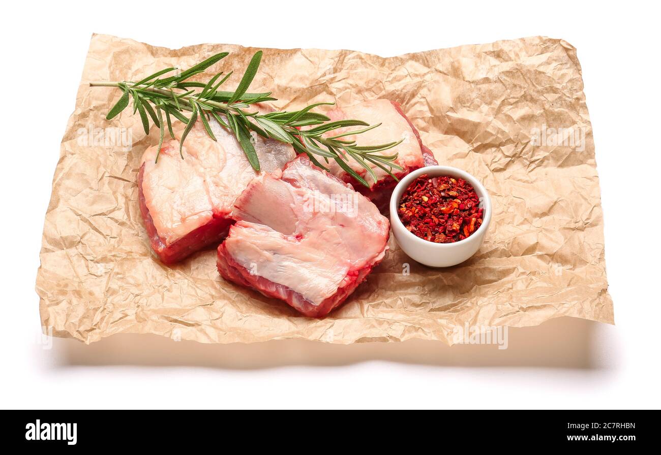 Raw beef short ribs with spices on white background Stock Photo - Alamy