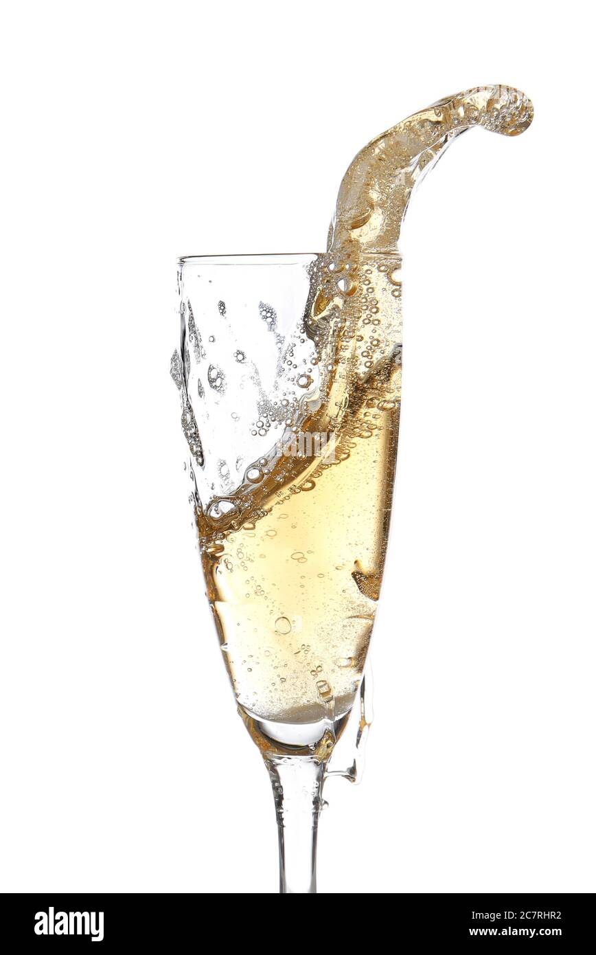 Glass of champagne with splash on white background Stock Photo - Alamy