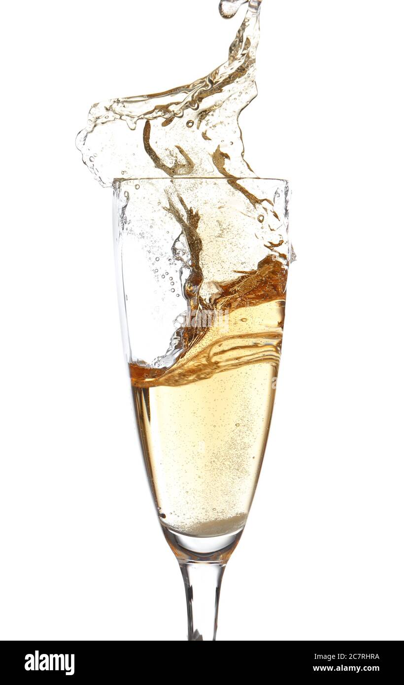 Glass of champagne with splash on white background Stock Photo - Alamy