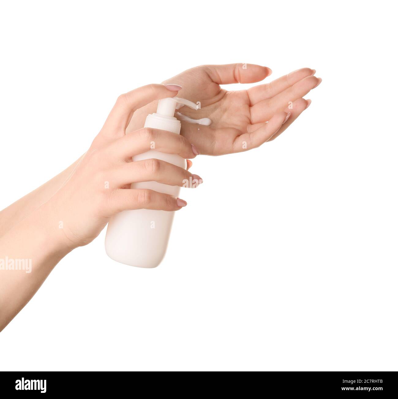 Beautiful young woman applying hand cream against white background ...