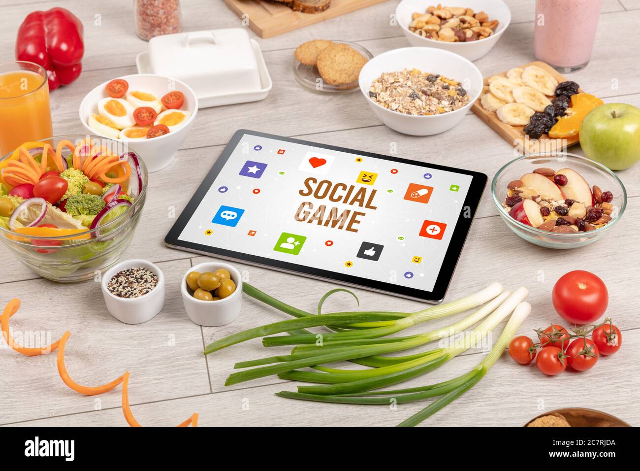 Healthy Tablet Pc compostion with SOCIAL GAME inscription, Social ...